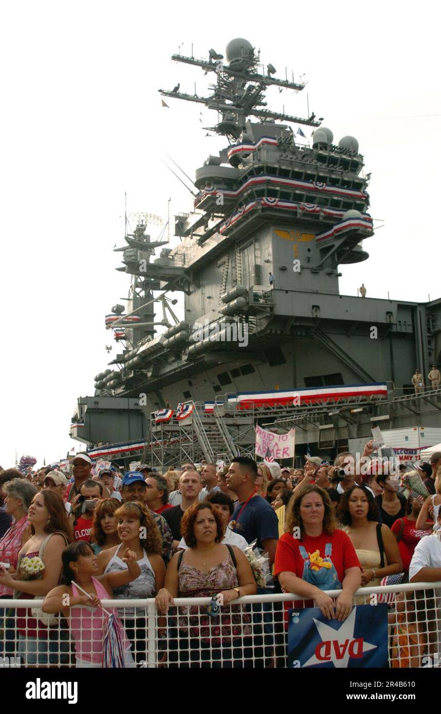 US Navy A large crowd awaits the crew of the Nimitz-class aircraft ...