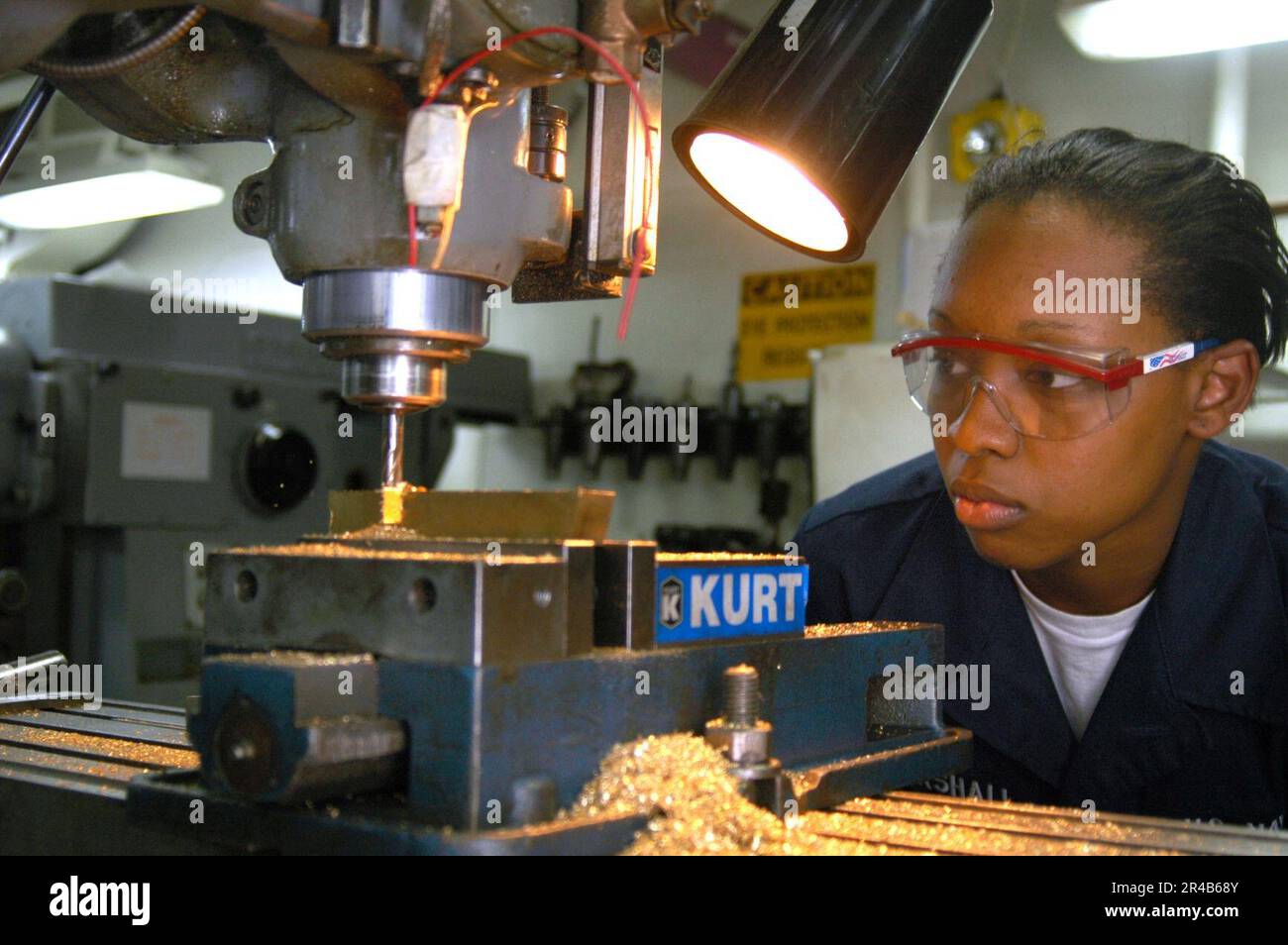 US Navy Machinery Repairman Fireman Apprentice fabricates a replacement ...