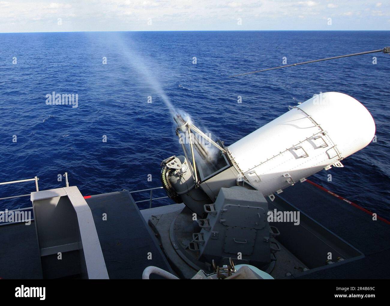 US Navy Smoke rolls down the barrels of the forward-starboard-mounted ...