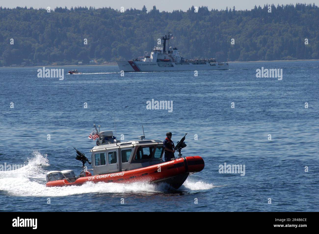US Navy A U.S. Coast Guard patrol craft provides security during the ...