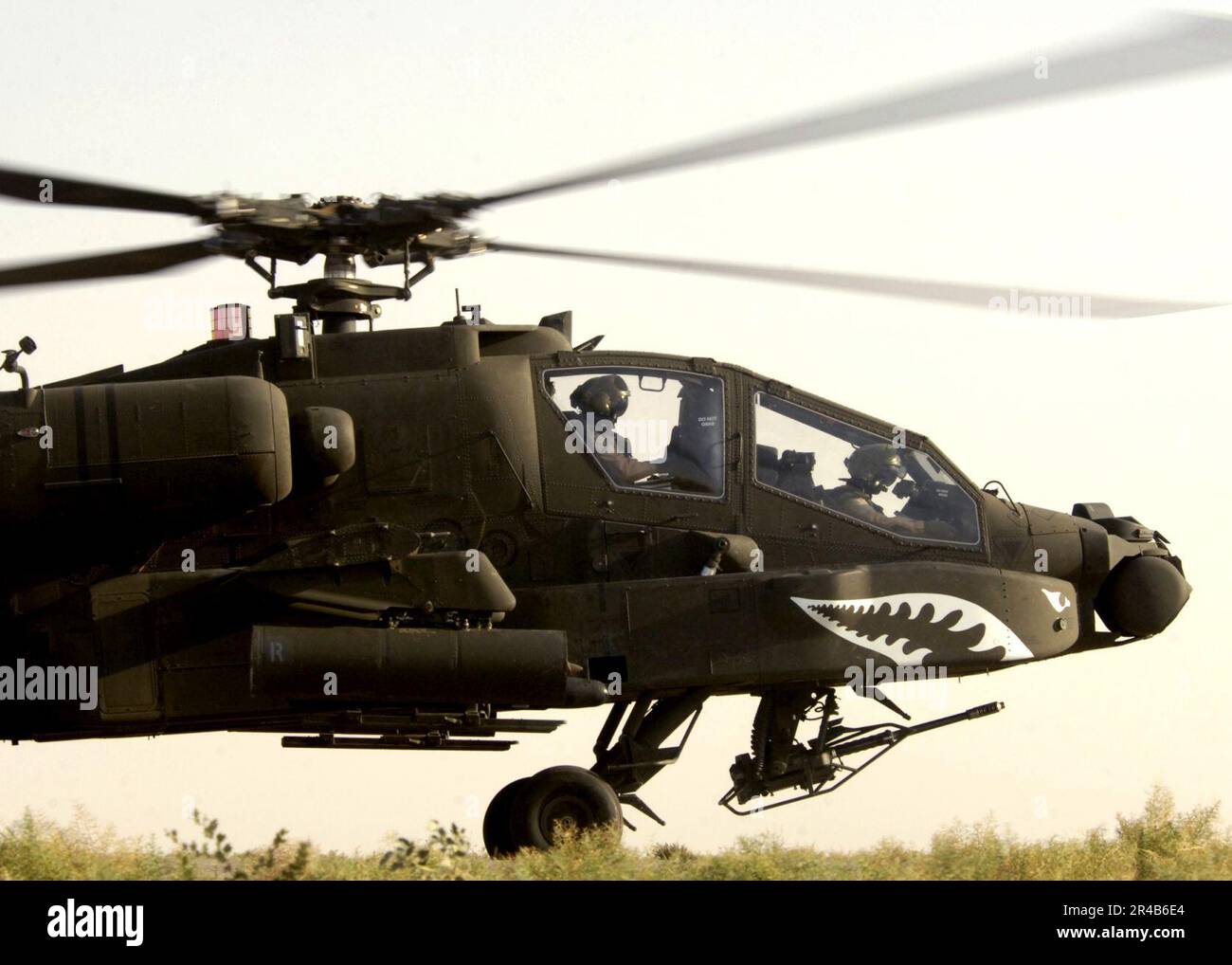 US Navy A U.S. Army AH-64 Apache helicopter prepares to takeoff for a ...