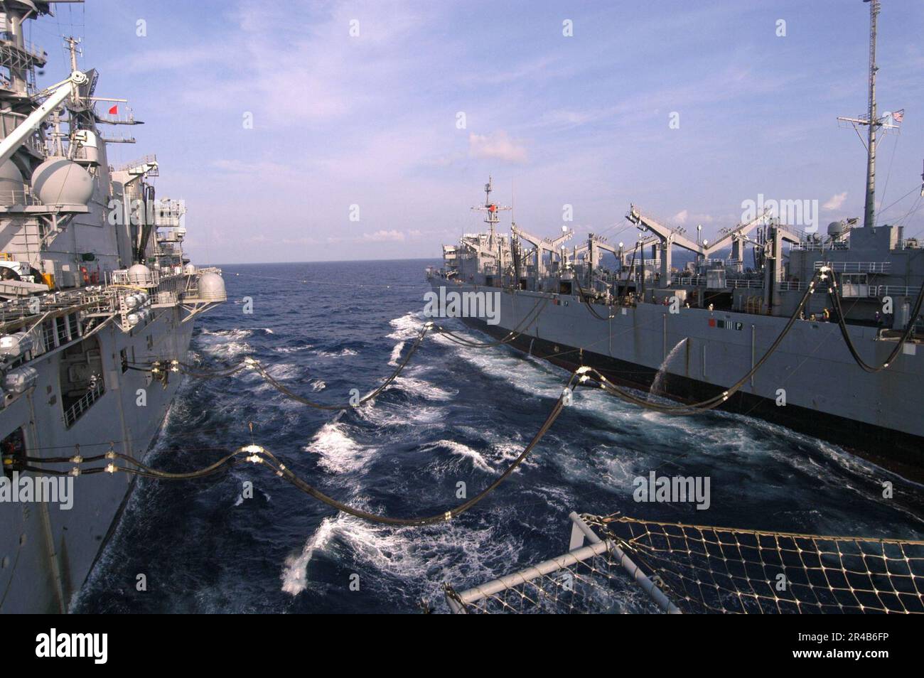 US Navy The amphibious assault ship USS Bataan (LHD 5) receives fuel ...