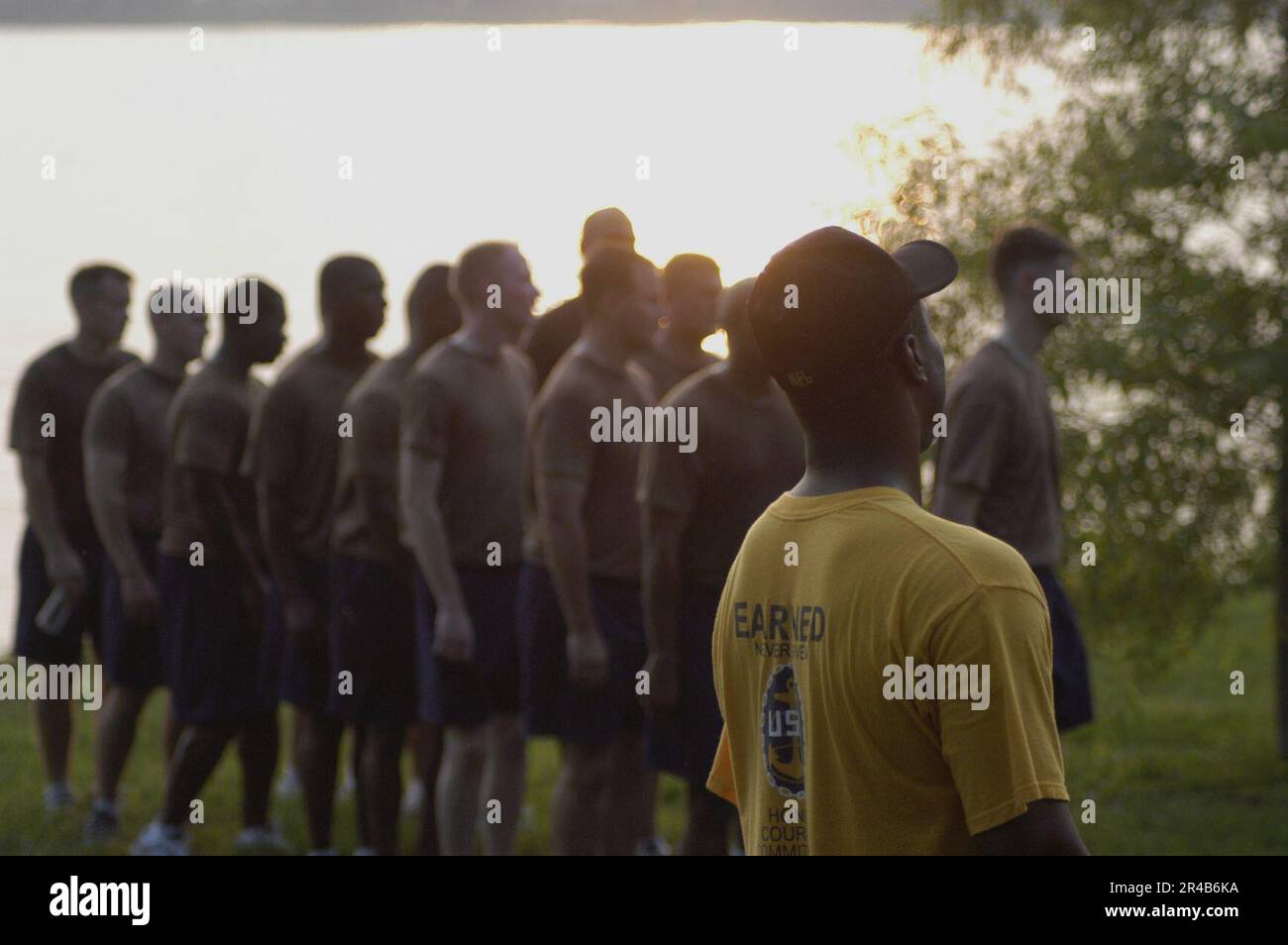 US Navy Chief Yeoman looks on as chief petty officer selectees assigned ...