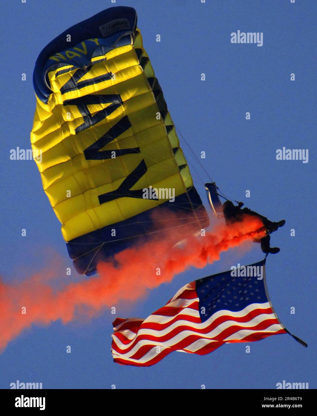 US Navy A Member of the U.S. Navy Parachute Team, the Leap Frogs ...