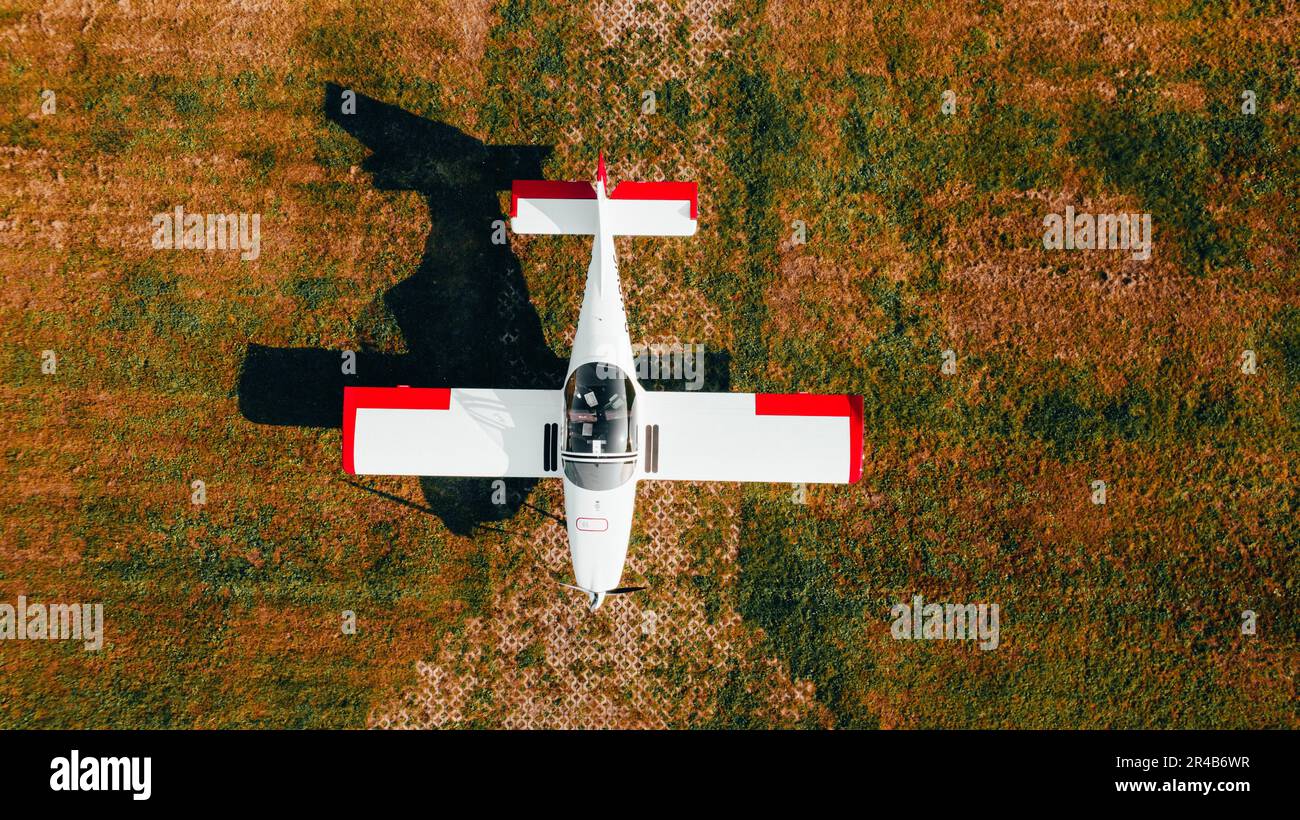 Red and white aircraft from above. Type Breezer B400-6, UL with 600 kg ...