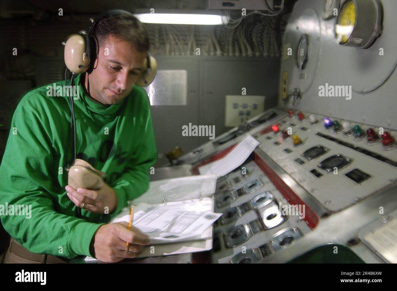 US Navy Chief Aviation Boatswain's Mate mans the Number Two Catapult ...