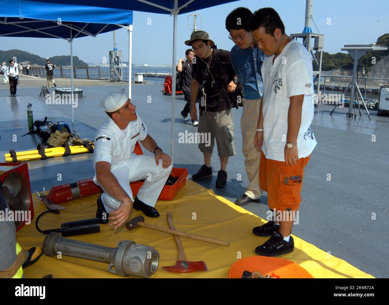 US Navy Damage Controlman 3rd Class explains damage control equipment ...
