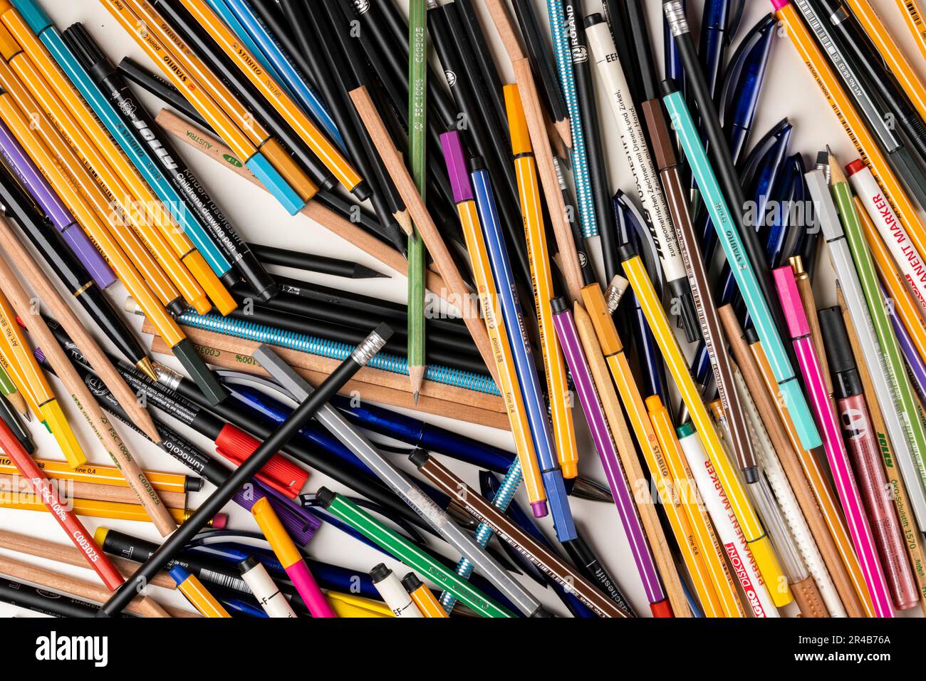 Various pens on a white background, full size Stock Photo - Alamy