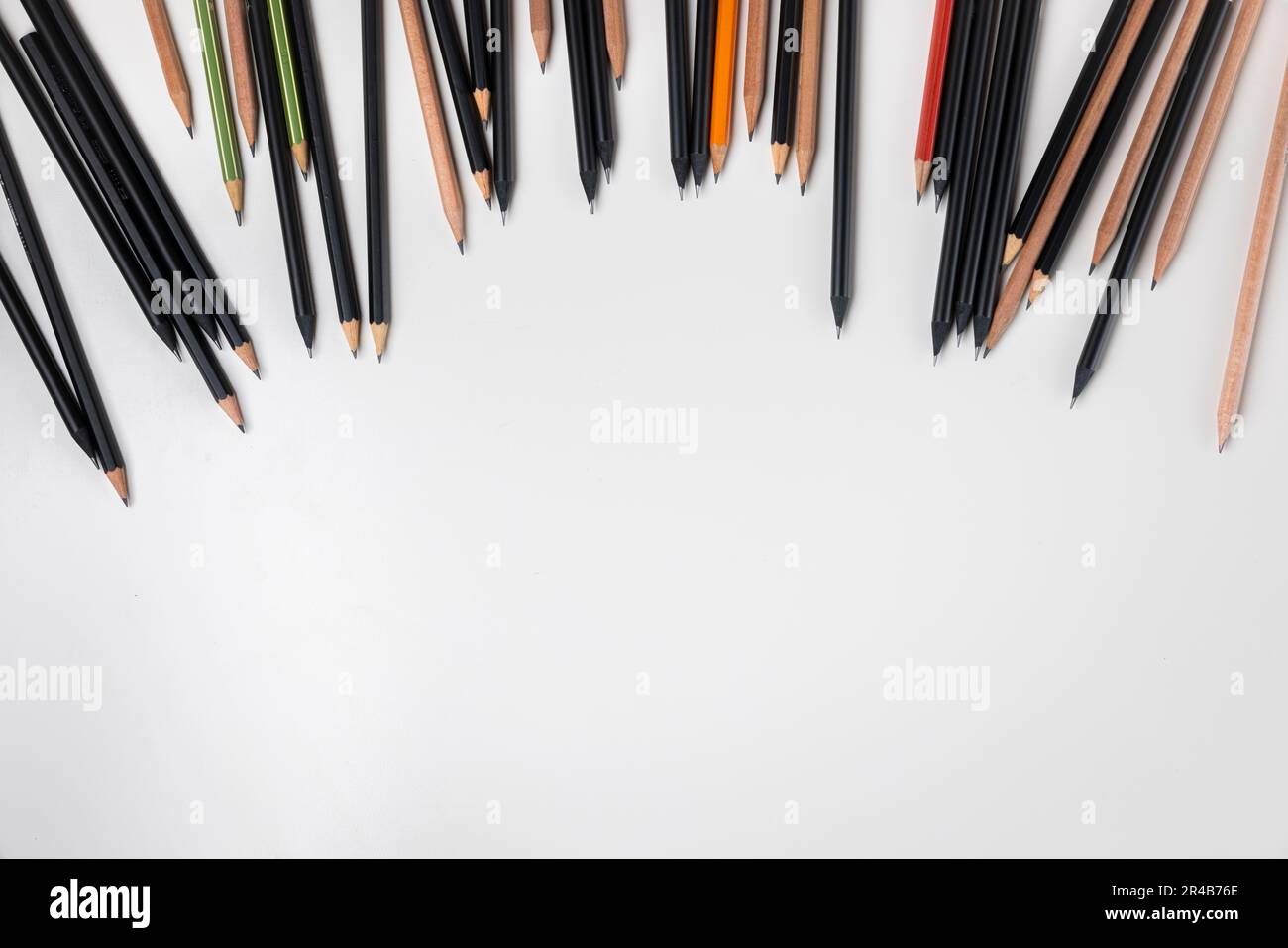 Various pencils above, white background, copying room below Stock Photo ...
