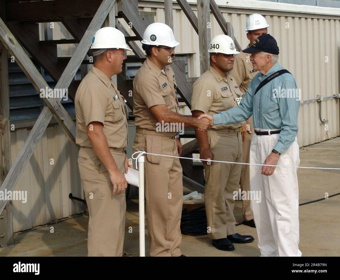 US Navy Former President Jimmy Carter shakes hands with Chief Hospital ...