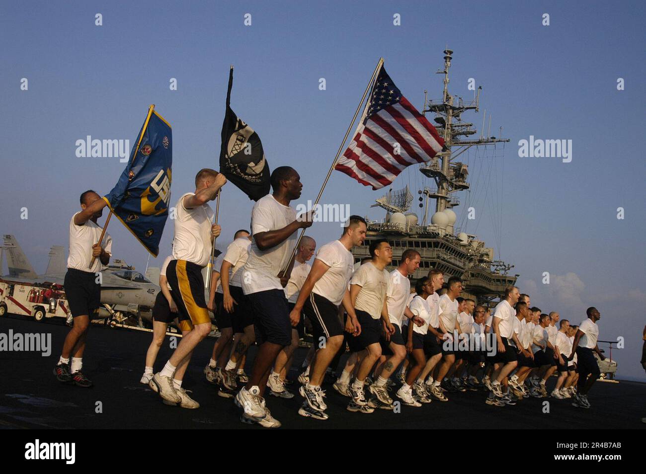 US Navy New chief petty officer (CPO) selectees march in place, while ...