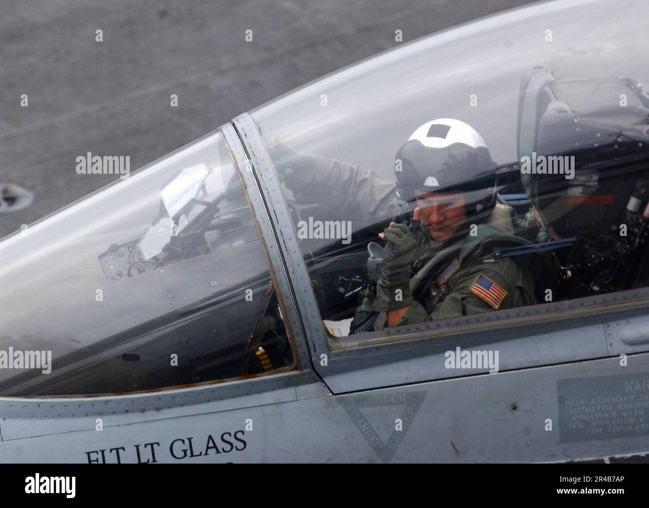 US Navy A student pilot signals his plane captain that he is starting ...