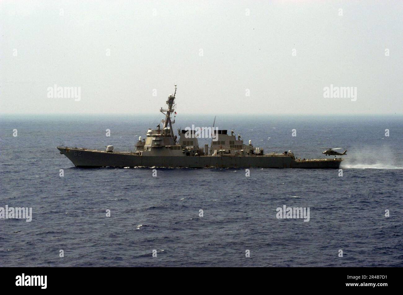 US Navy An SH-60 Seahawk helicopter prepares to land on the guided ...