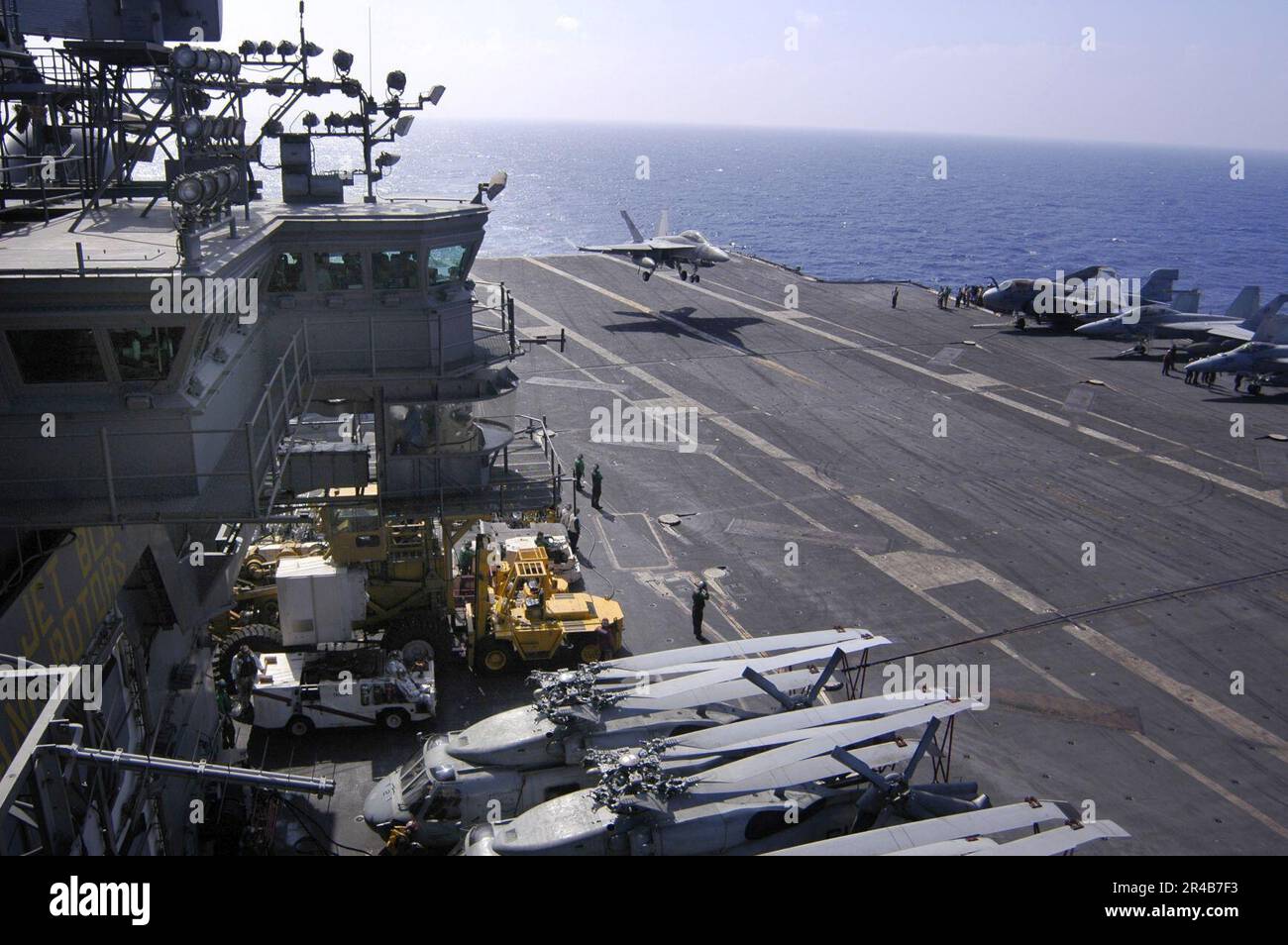 US Navy An F-A-18F Super Hornet lands on the flight deck aboard the ...