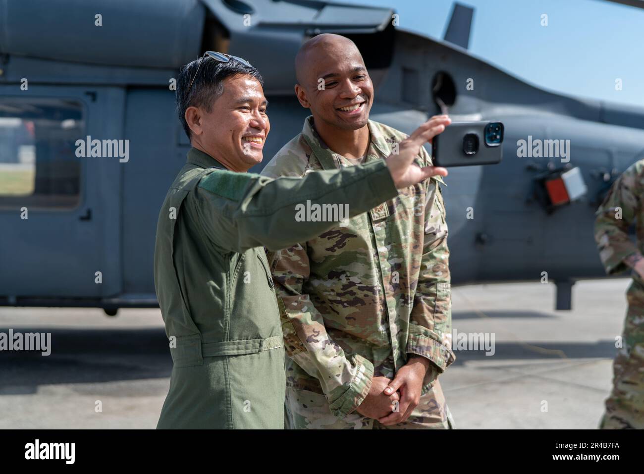 Philippine Air Force Col. Joel Inacay, left, 15th Strike Wing deputy ...