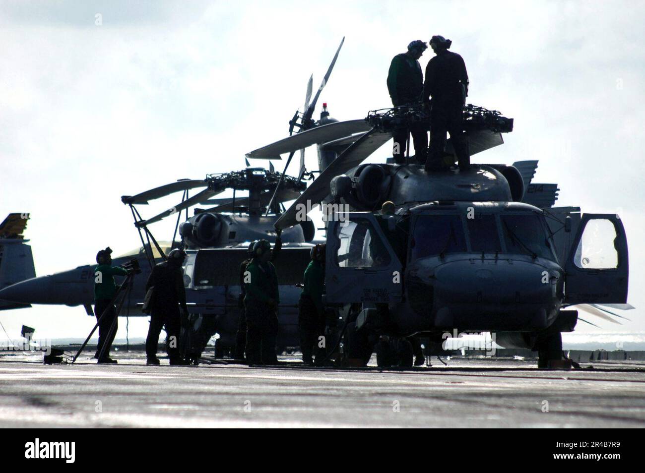 US Navy Sailors assigned to Helicopter Anti-Submarine Squadron Fourteen ...