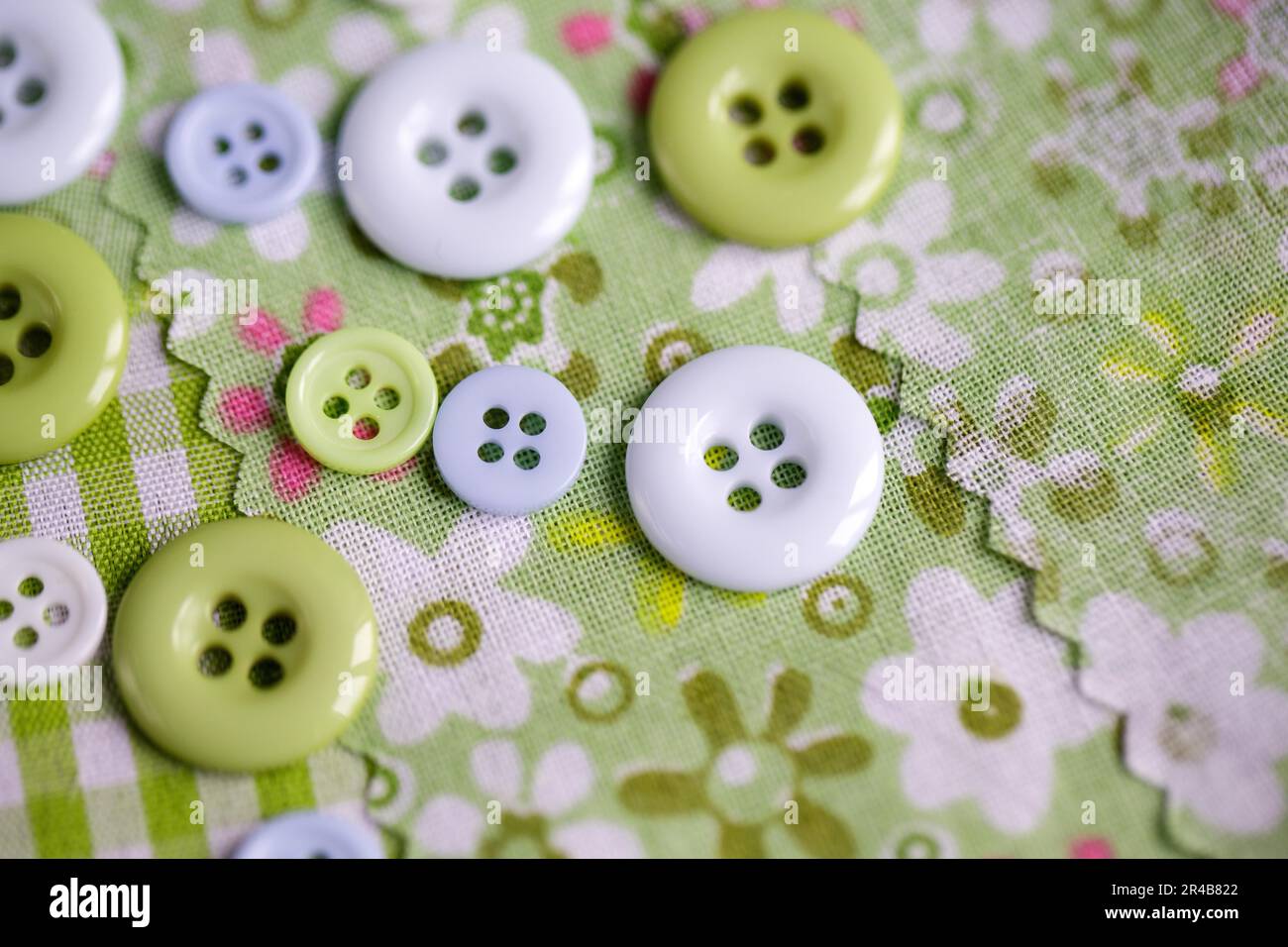 Pastel coloured buttons in different sizes in blue and green Stock ...