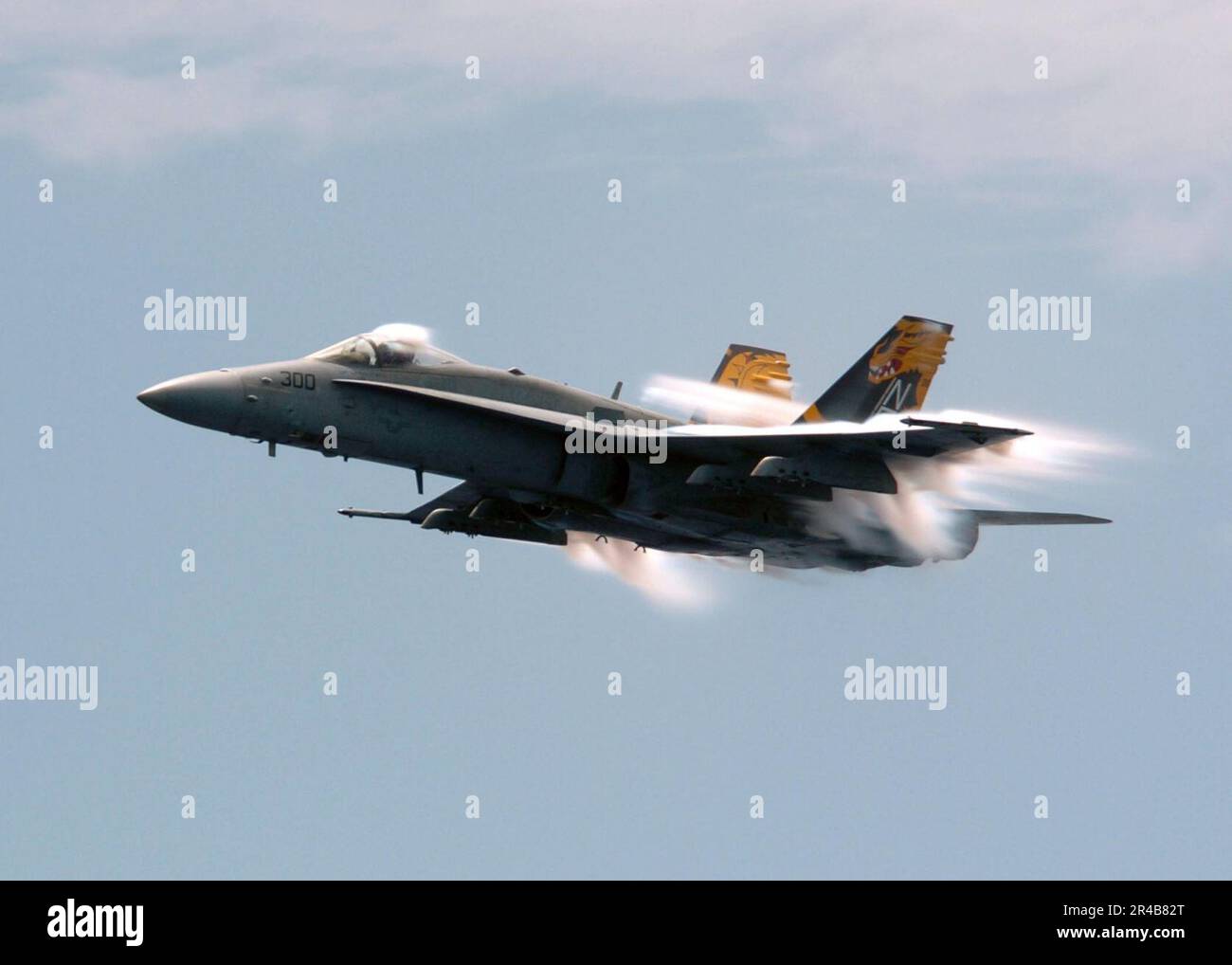 US Navy An F-A-18C Hornet conducts a high-speed pass prior to breaking ...