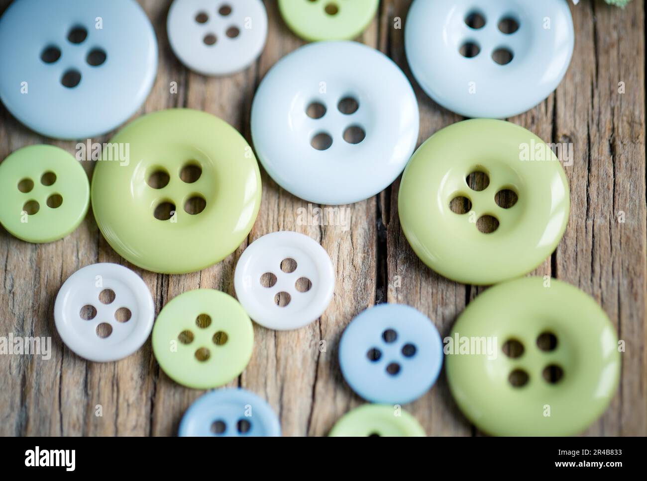 Pastel coloured buttons in different sizes in blue and green Stock ...