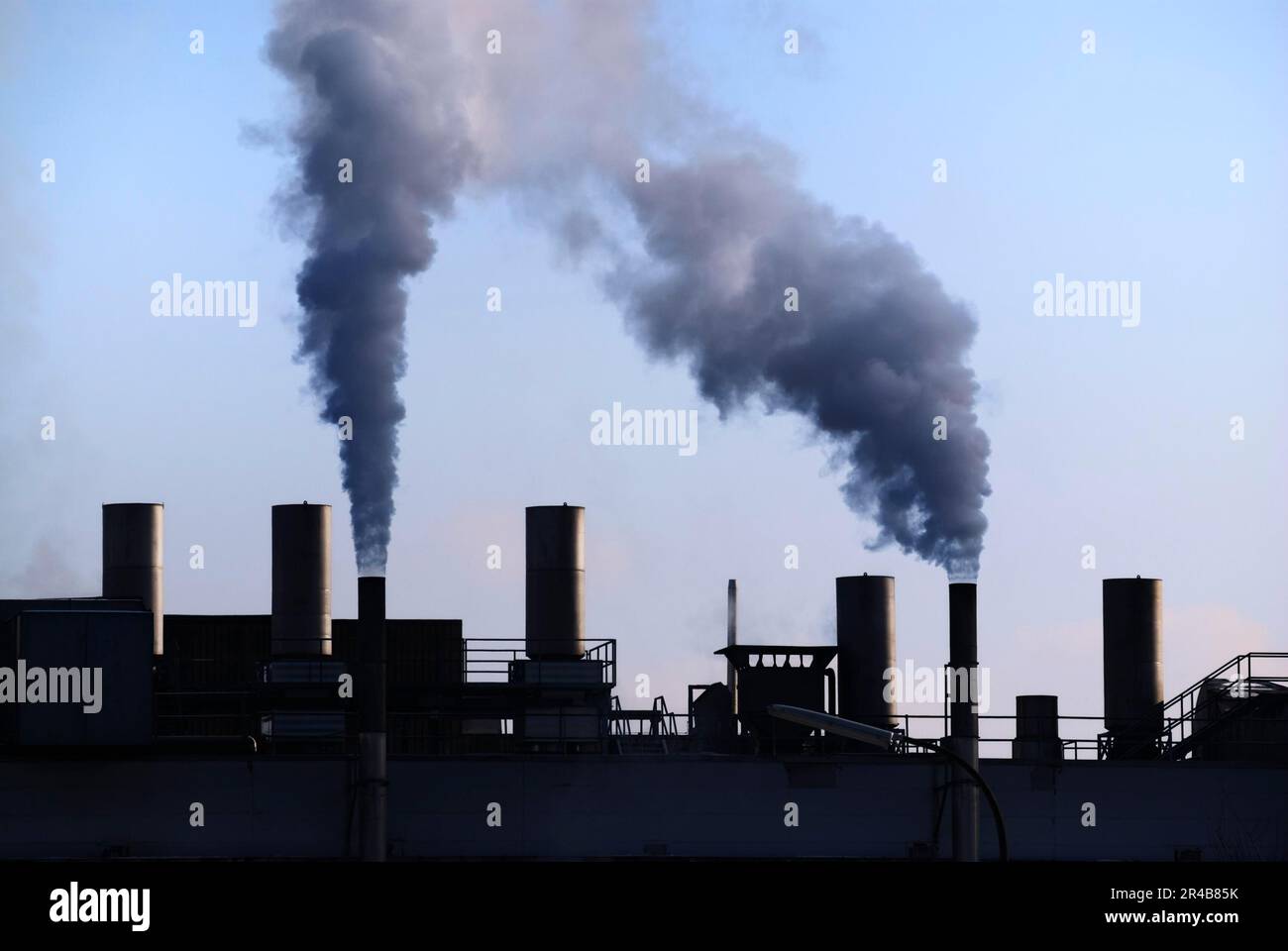 Air pollution, dirty smoke comming out of a chimney Stock Photo - Alamy