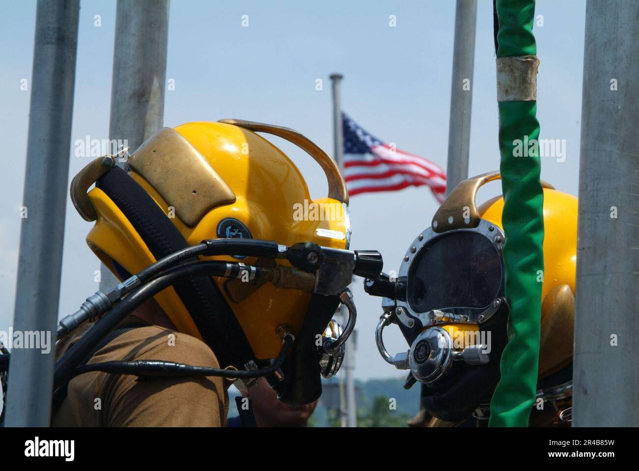 US Navy A pair of Philippine Navy divers prepare to be lowered into the ...