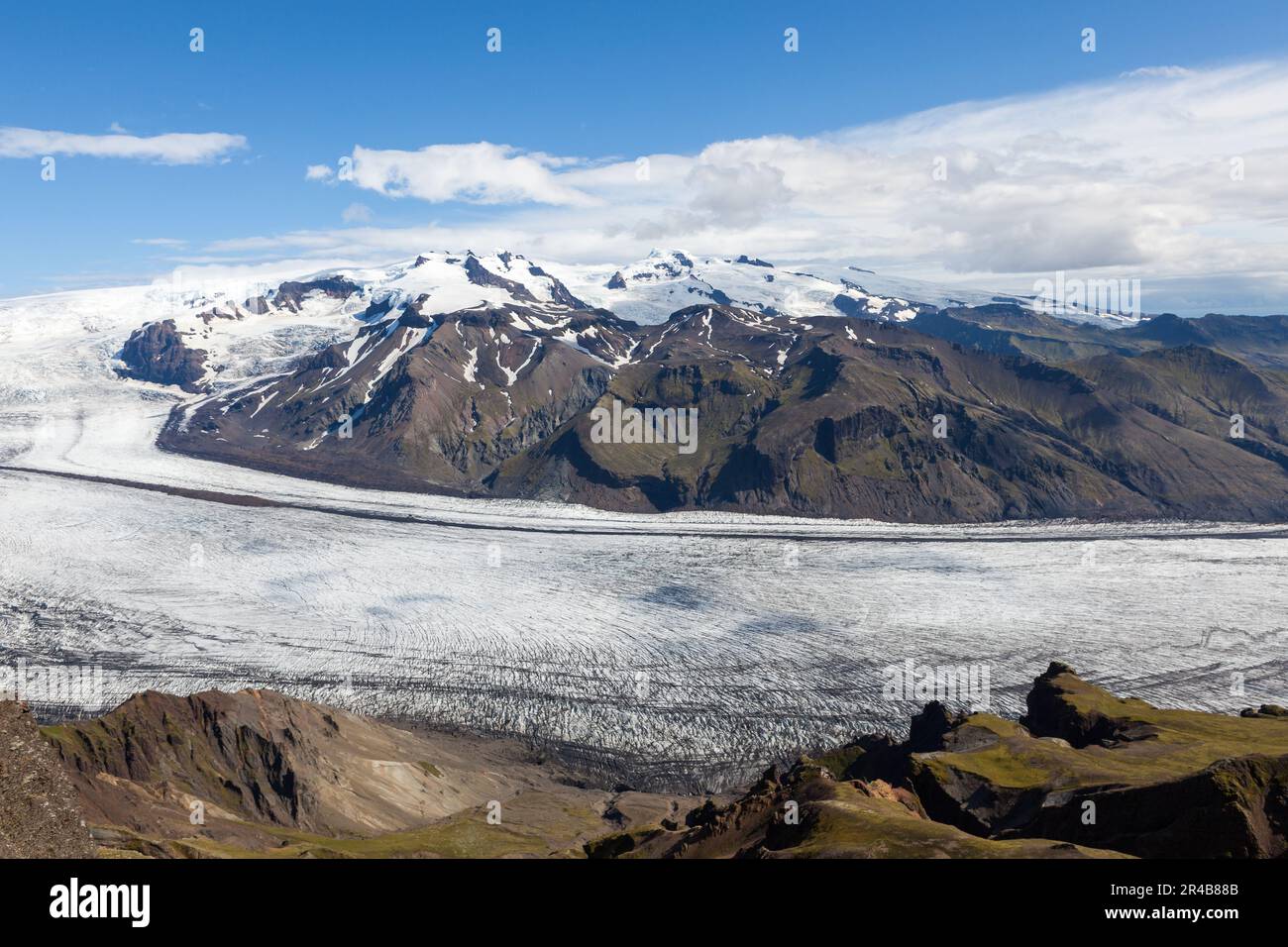 Skaftafellsjokull glacial river flowing down the volcano mountain ...