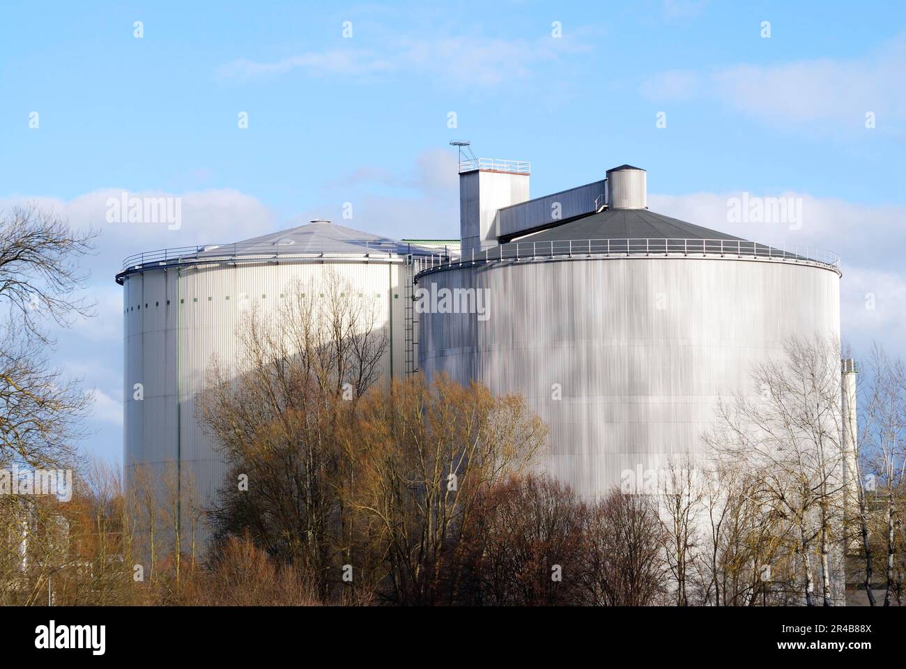Two huge industrial storage tanks Stock Photo - Alamy