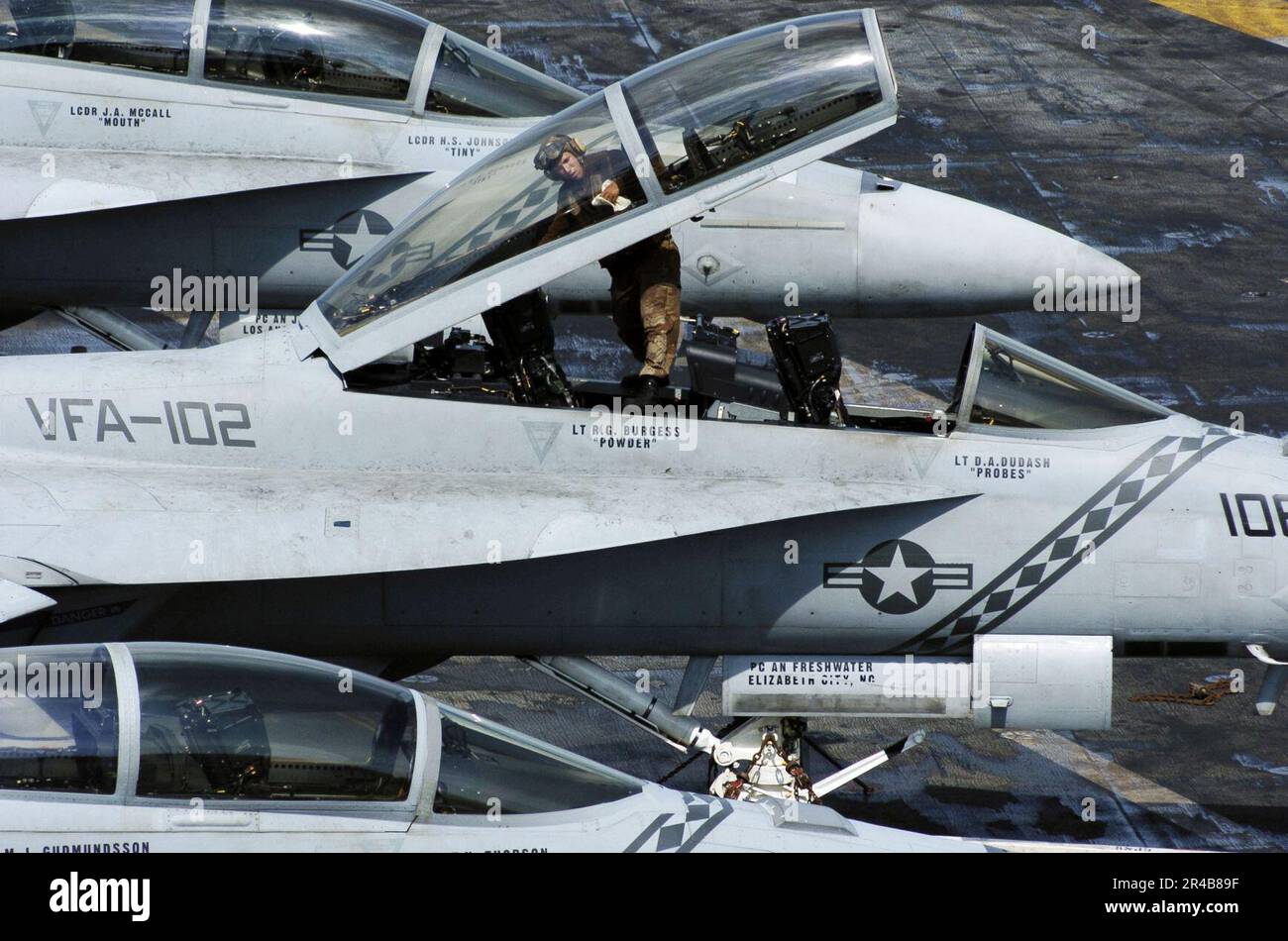 US Navy A Sailor cleans the canopy of an F-A-18F Super Hornet Stock ...