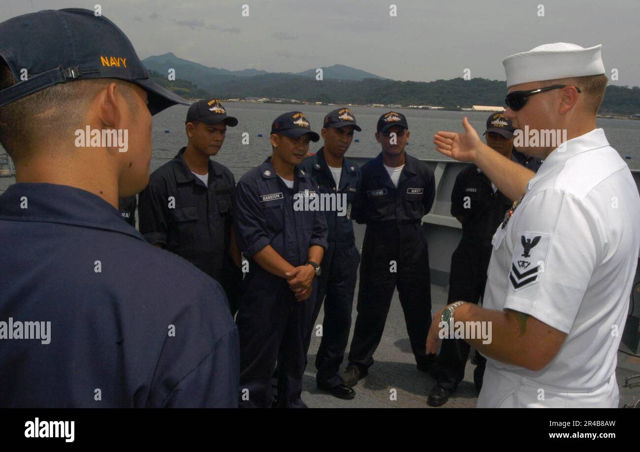 US Navy Fire Controlman 2nd Class explains his visit, board, search and ...
