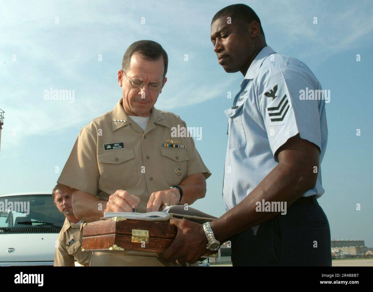 US Navy Chief of Naval Operations (CNO) Adm. Mike Mullen signs Chief ...