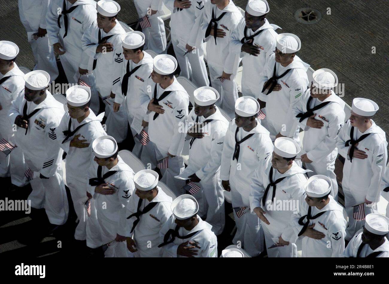 US Navy Sailors recite the pledge of allegiance after becoming U.S ...