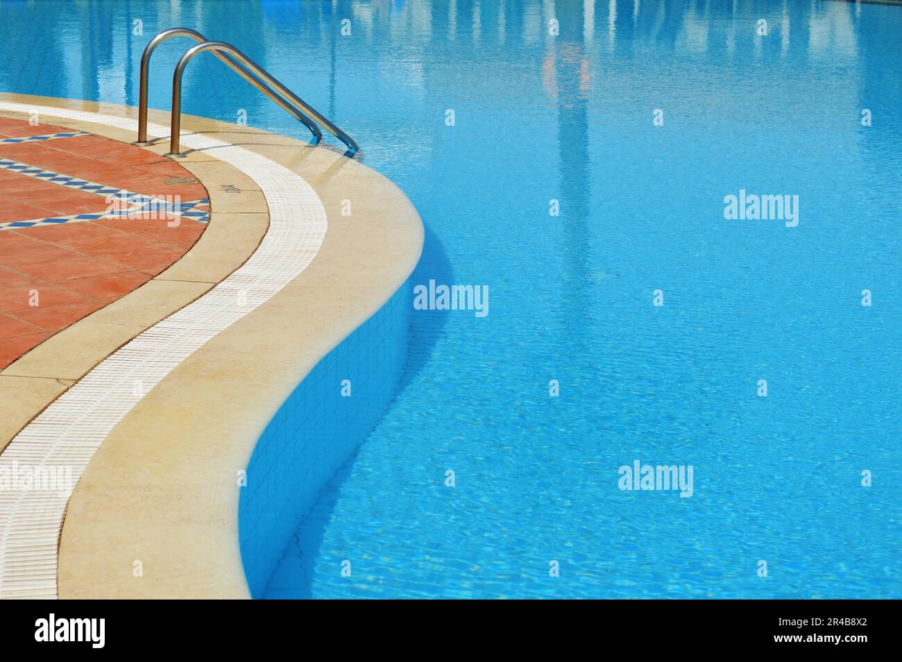Swimming pool in touristic resort during summer time Stock Photo - Alamy