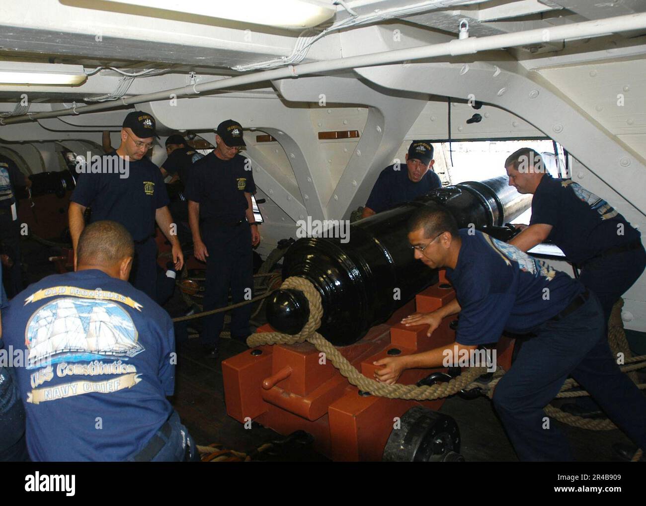 US Navy Chief petty officer (CPO) selectees practice loading and firing ...
