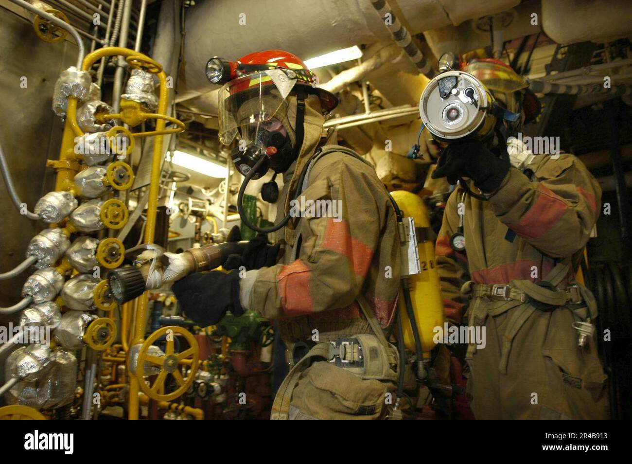 US Navy An on-scene leader uses a Naval Firefighter Thermal Imaging ...