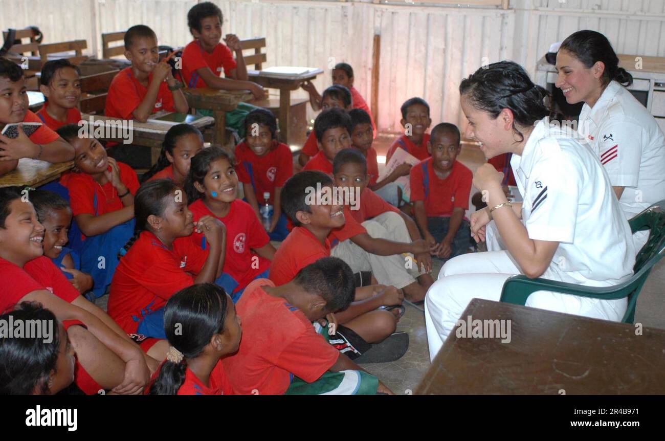 US Navy Operations Specialist Seaman and Damage Controlman Fireman talk ...
