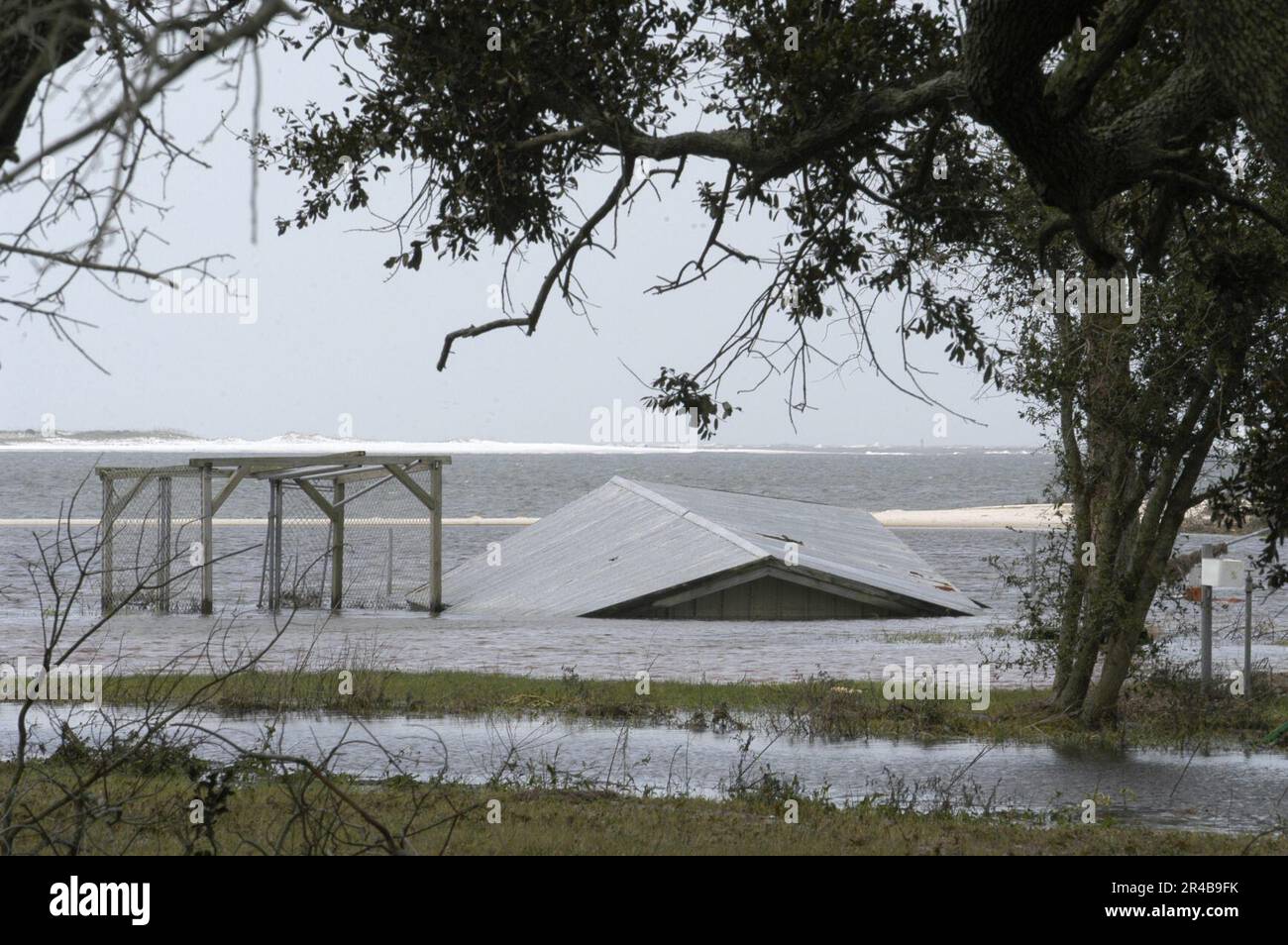 US Navy A small shed swept off its base by the storm surge caused by ...