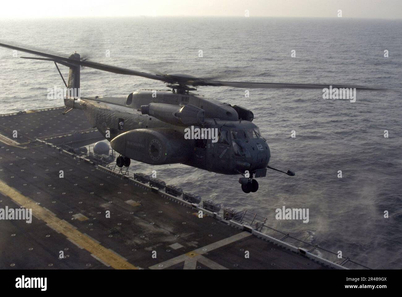 US Navy An MH-53E Sea Dragon helicopter takes off from the flight deck ...