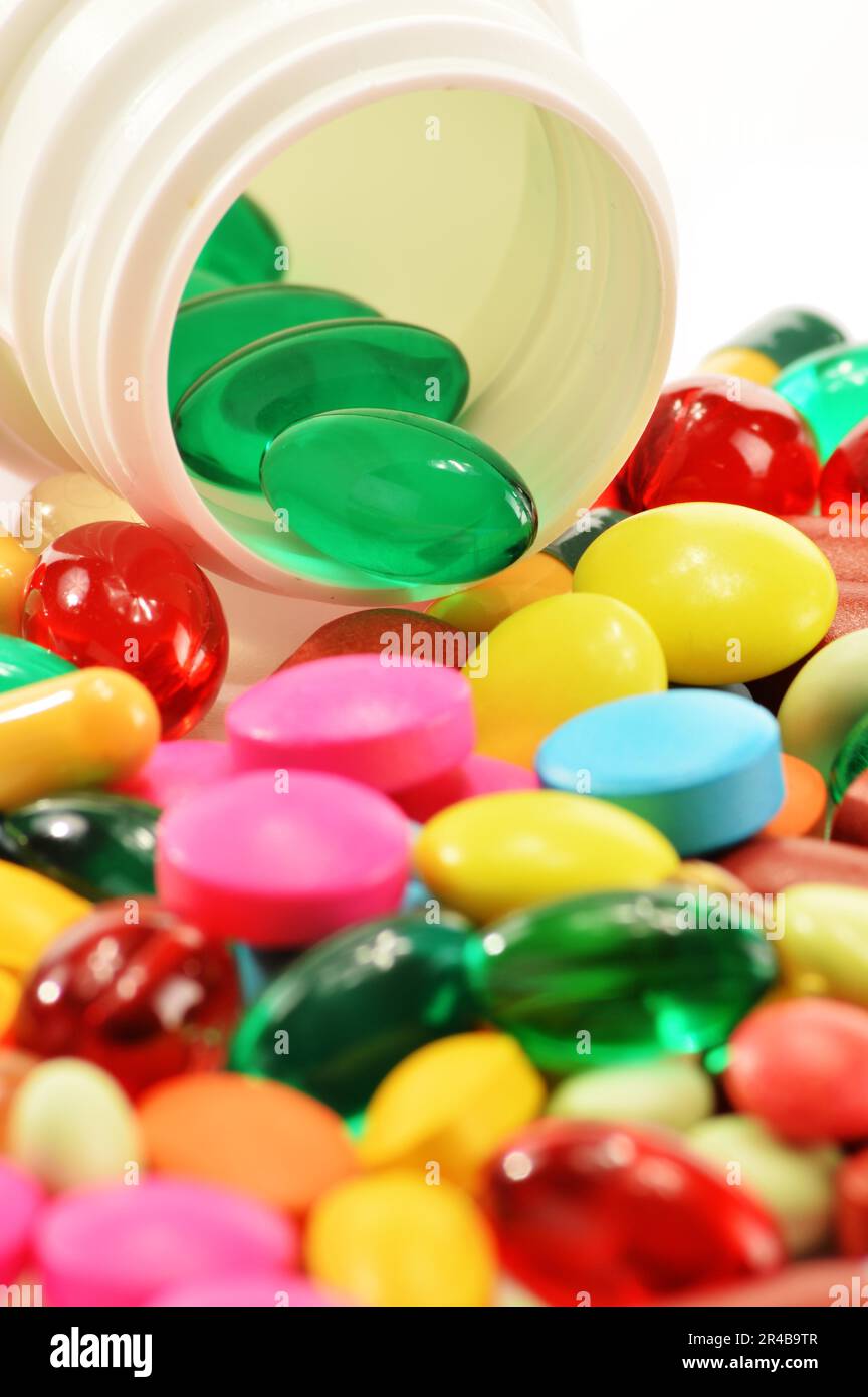 Composition with dietary supplement capsules and drug pills Stock Photo ...