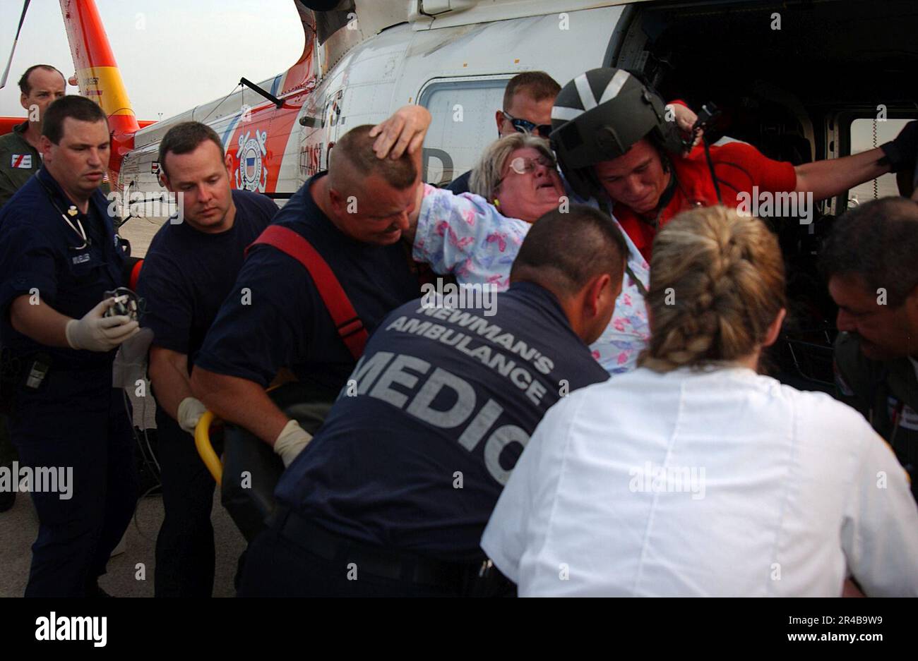 US Navy A U.S. Coast Guard helicopter rescue crew and paramedics from ...