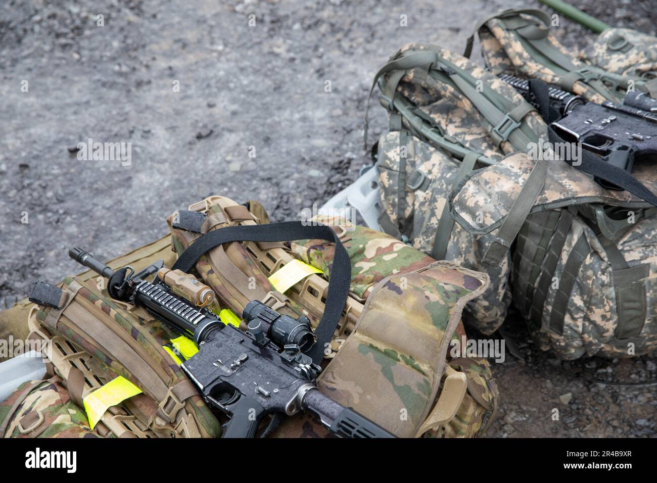 10th Mountain Soldiers place their gear dress right dress in ...