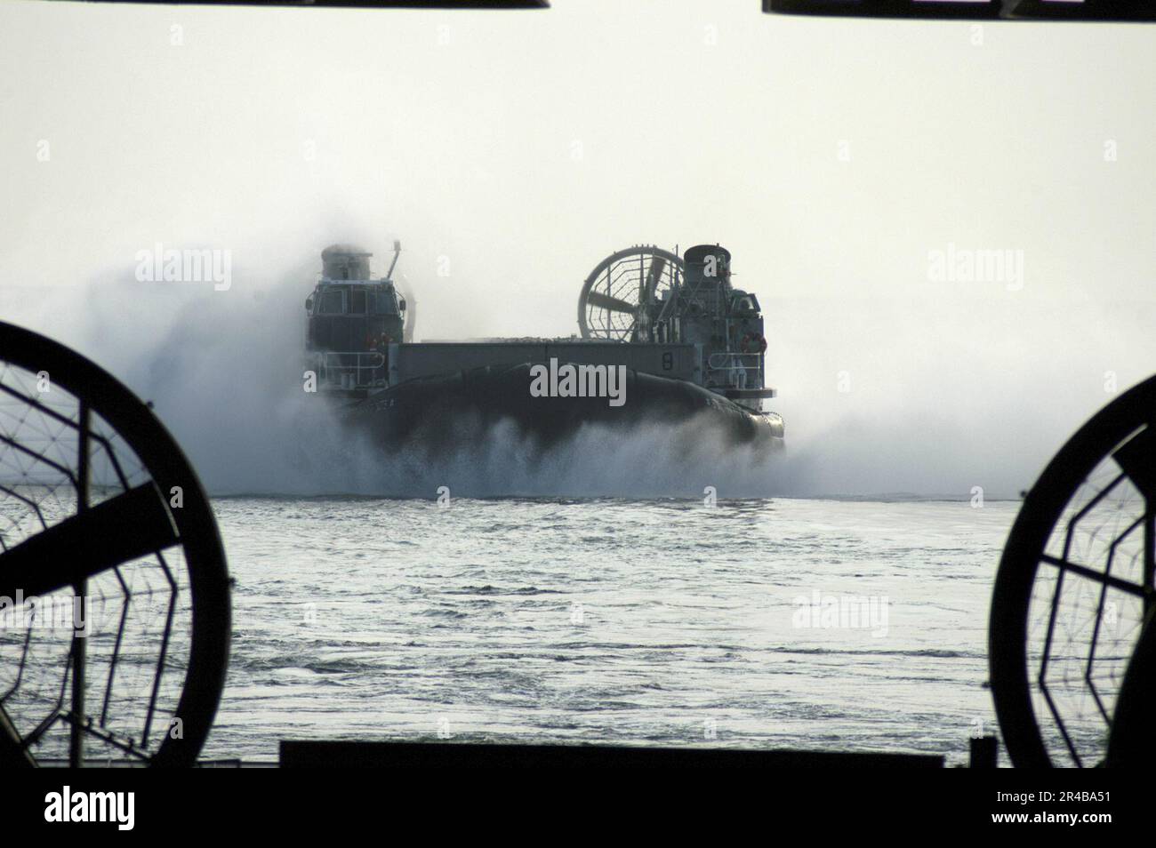 US Navy A Landing Craft, Air Cushion (LCAC) prepares to enter the well ...