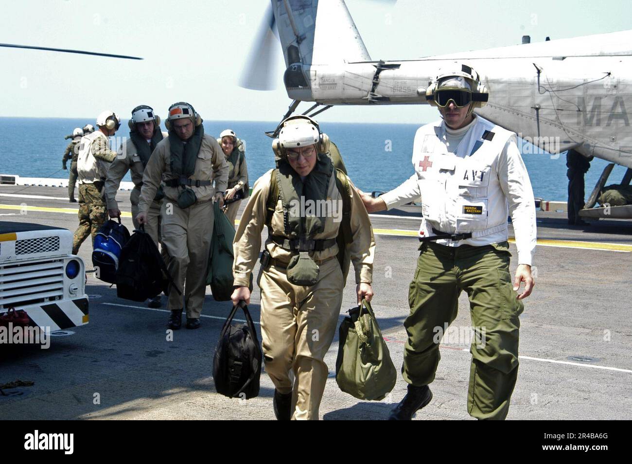 US Navy U.S. Navy medical personnel land aboard the multi-purpose ...