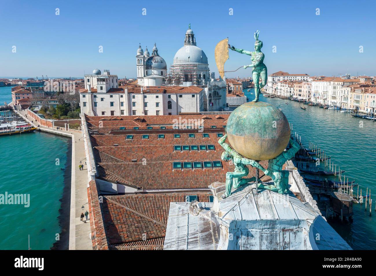 Drone footage of the Dogana da Mar, moving wind vane of St. Fortuna on ...