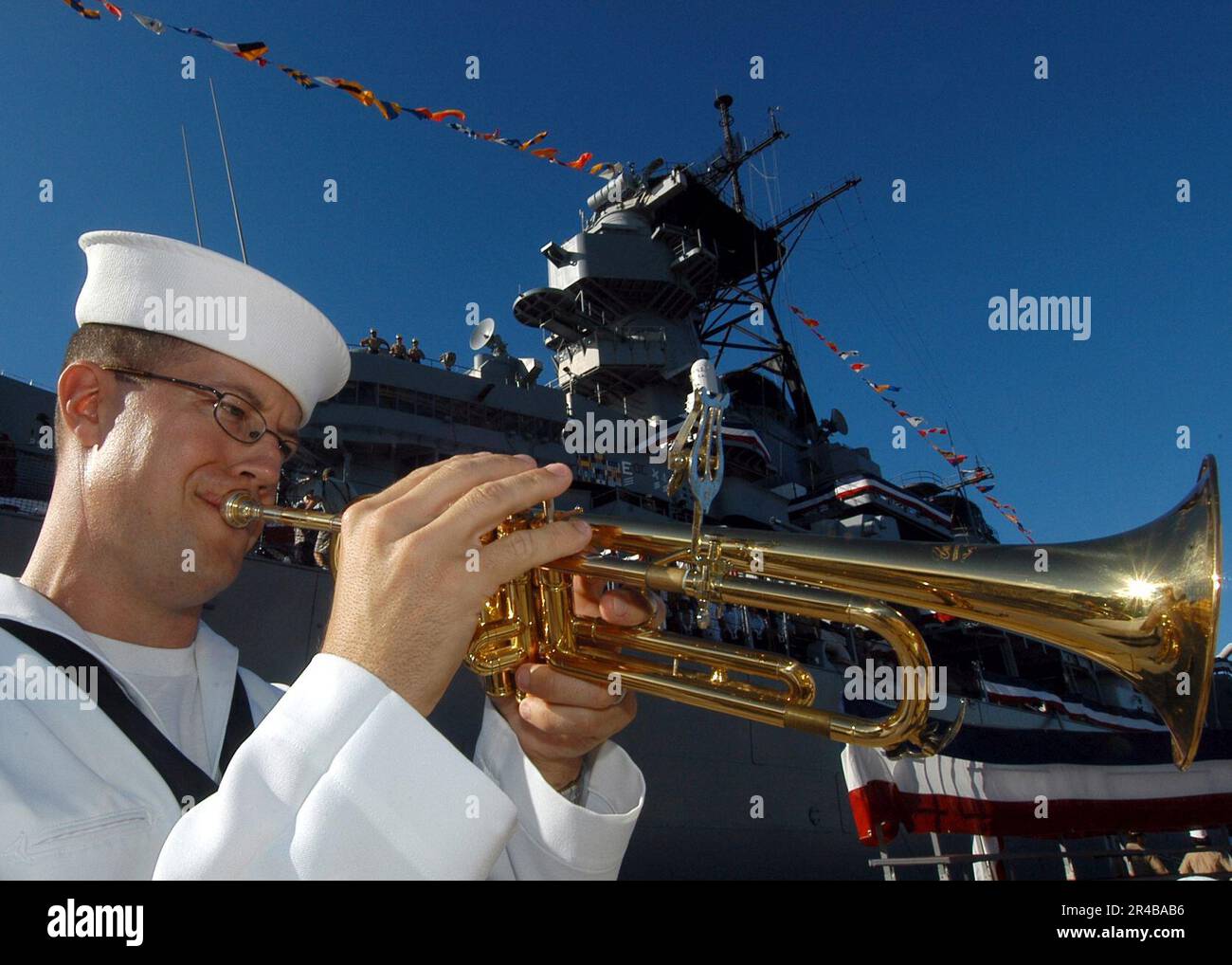 US Navy Musician 1st Class practices as the primary bugler during the ...