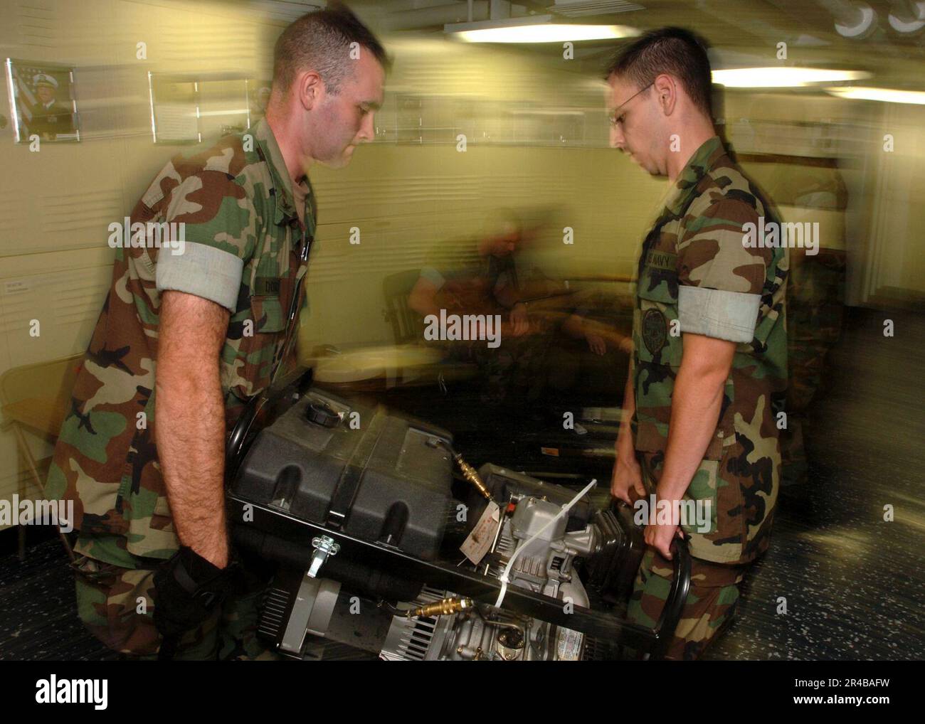 US Navy Master-at-Arms 3rd Class left, and Aviation Support Equipment ...