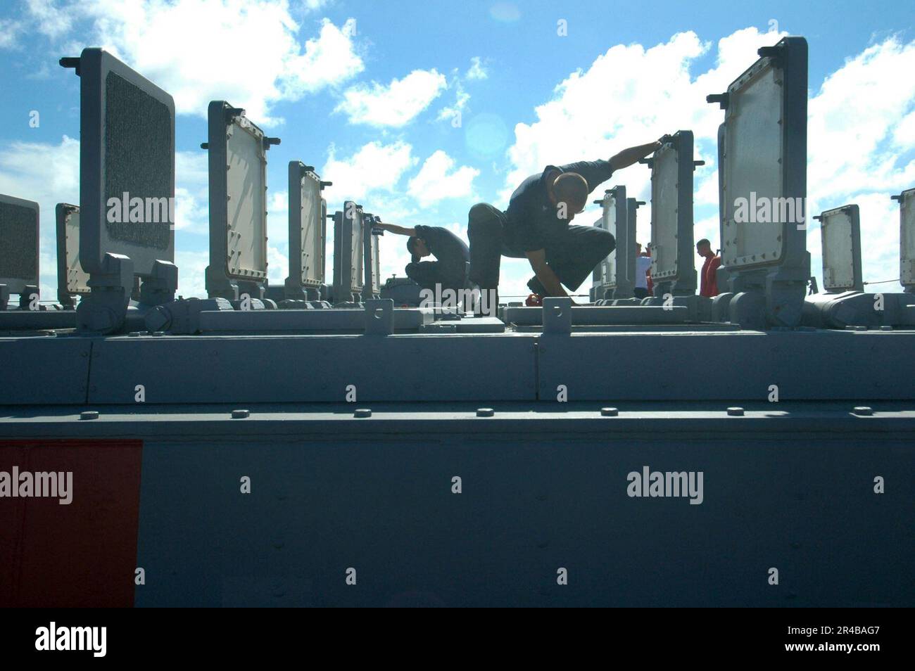 US Navy Sailors aboard the guided missile destroyer USS Fitzgerald (DDG ...