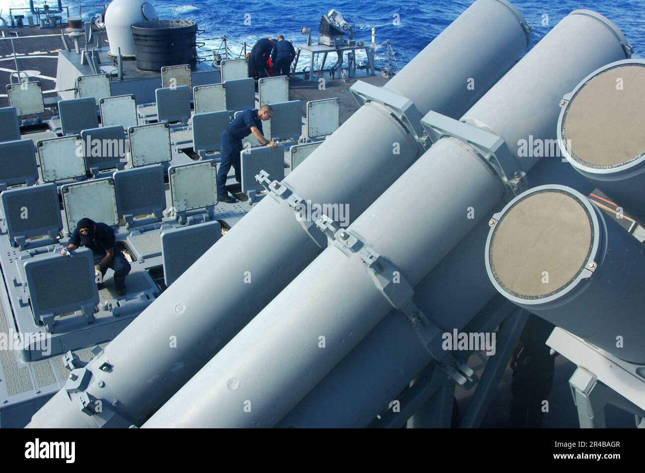 US Navy Sailors aboard the guided missile destroyer USS Fitzgerald (DDG 62) inspect the MK 41 ...