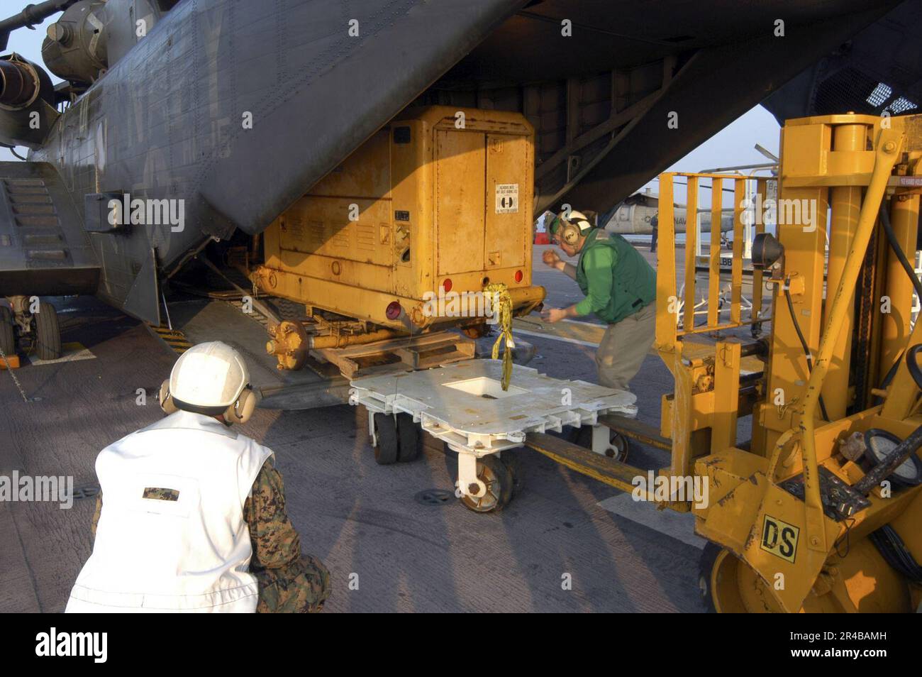 US Navy Crew members assigned to the amphibious assault ship USS Bataan ...