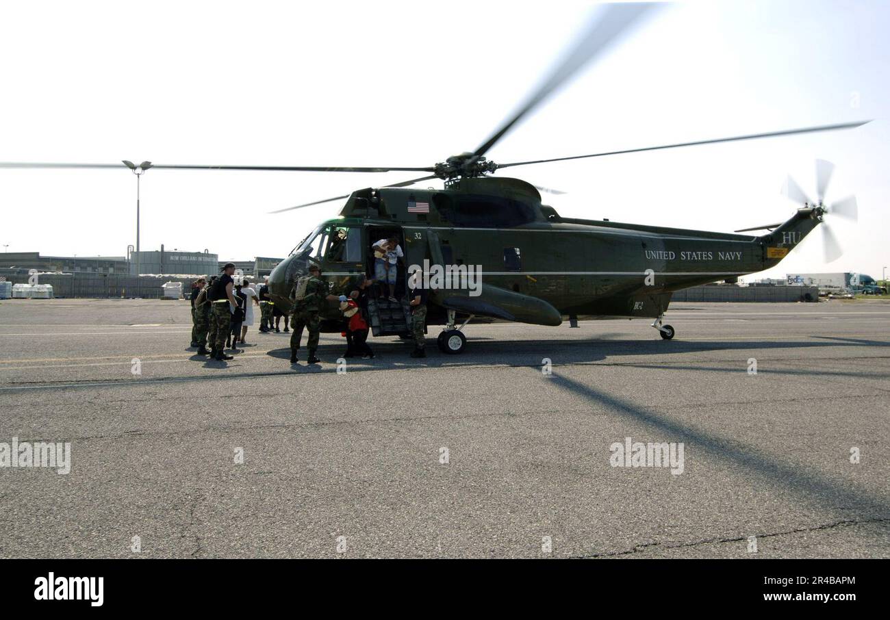 US Navy A U.S. Navy UH-3H Sea King helicopter delivers rescued New ...