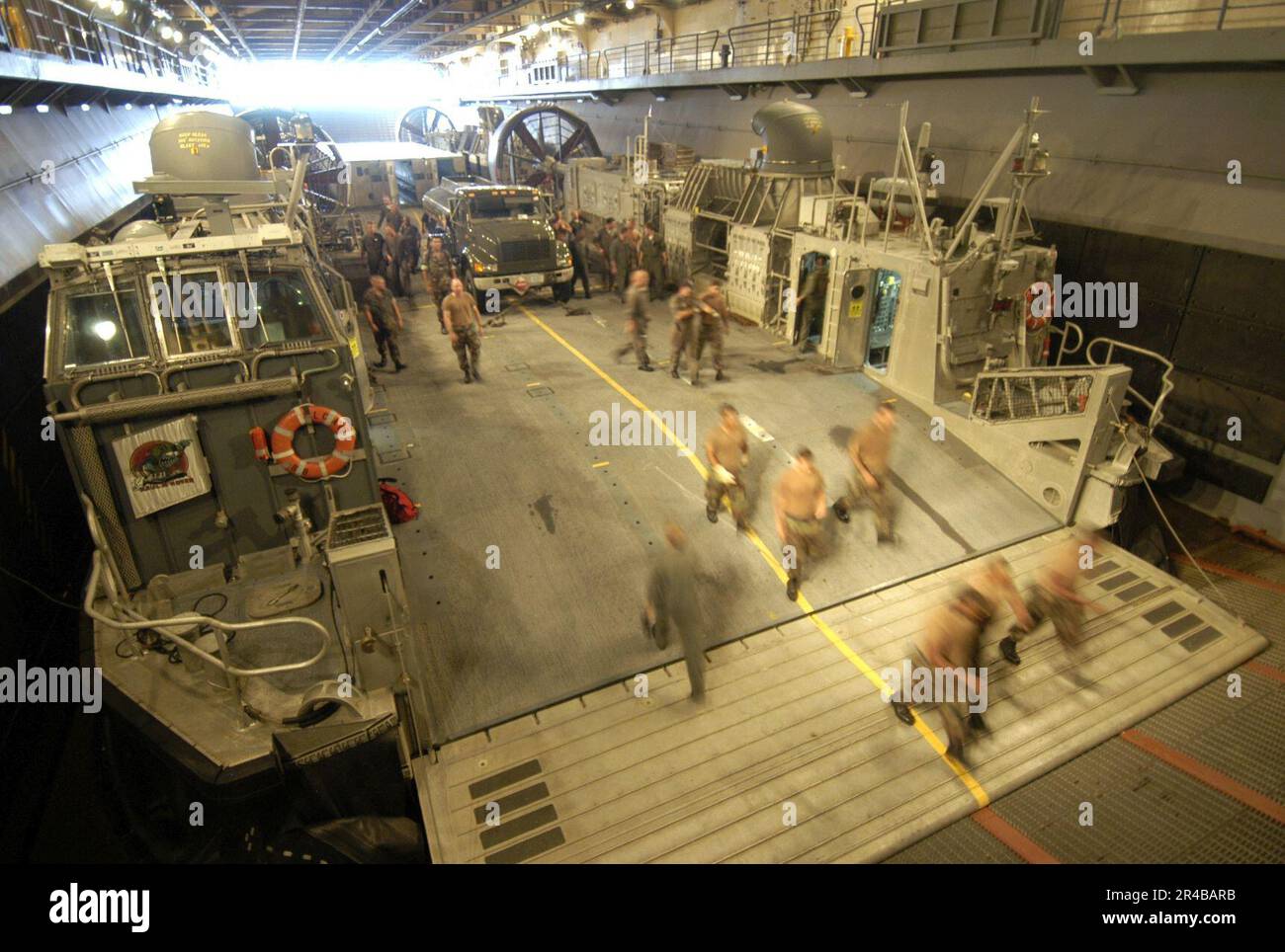 US Navy U.S. Navy personnel assigned to the amphibious assault ship USS ...